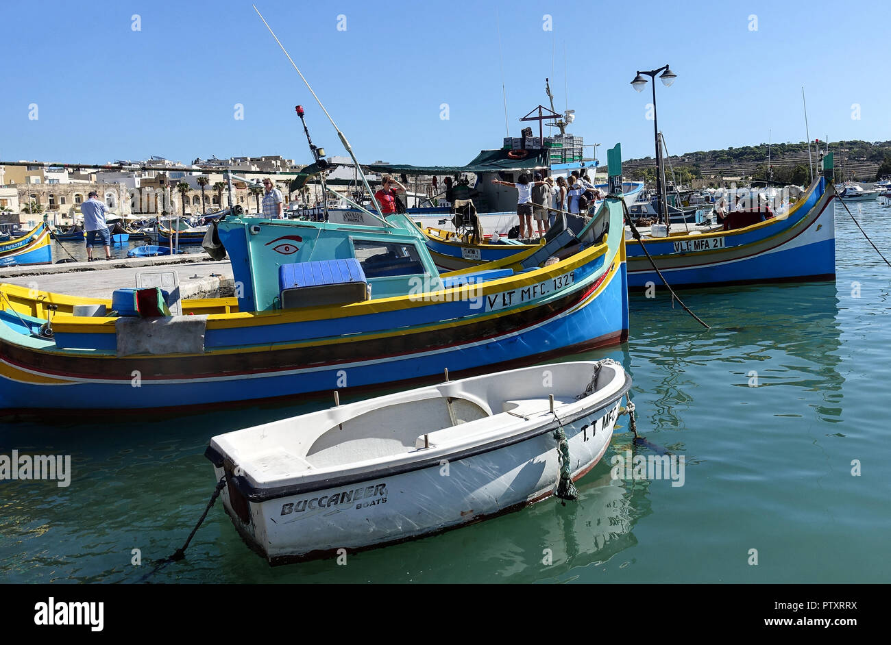 Traditional maltese fishing boats hi-res stock photography and images ...