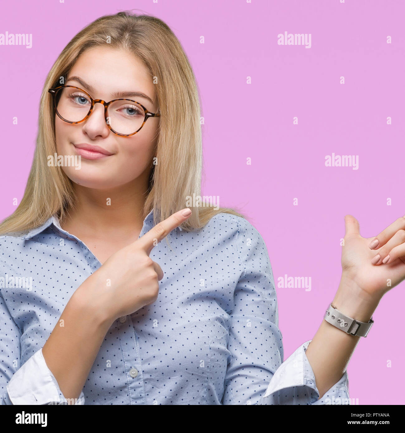 Young caucasian business woman wearing glasses over isolated background ...