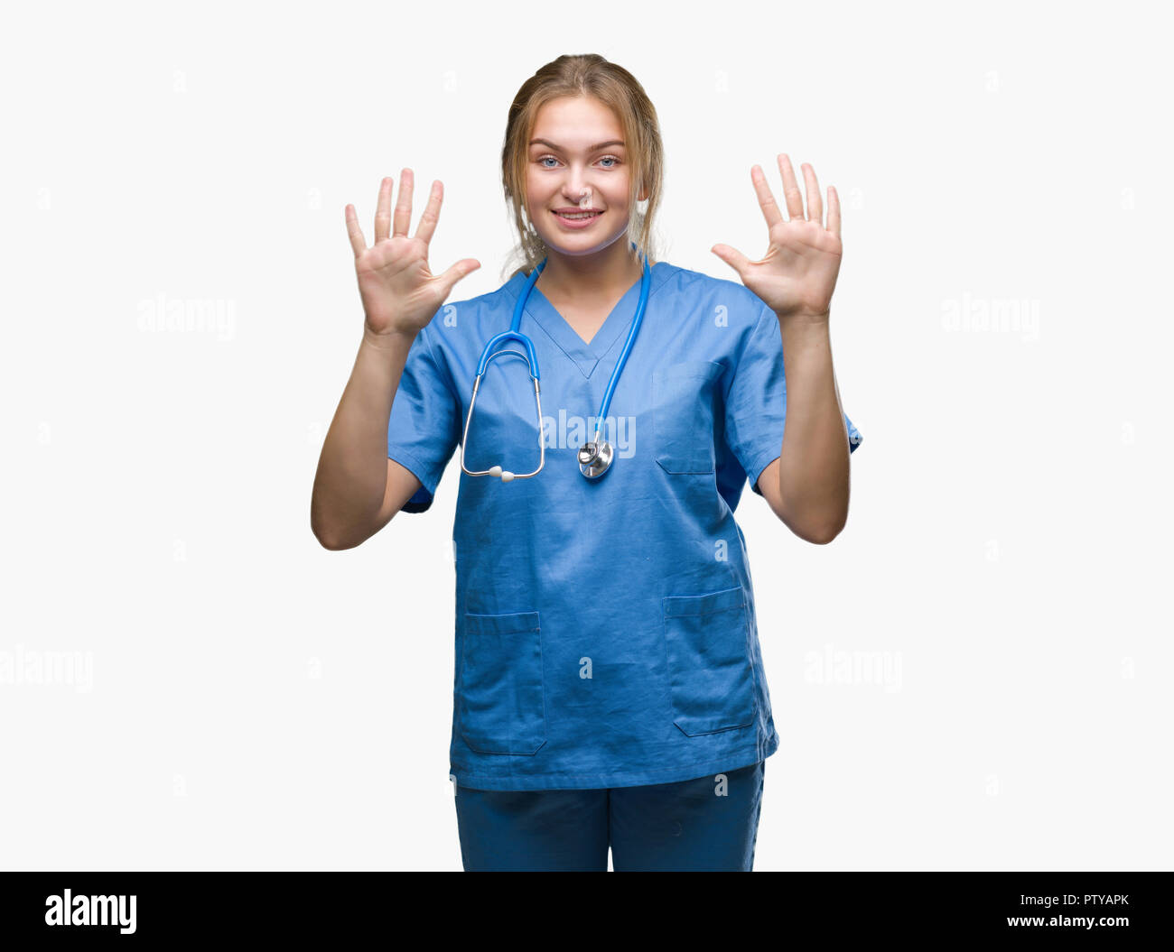 Young caucasian doctor woman wearing surgeon uniform over isolated ...