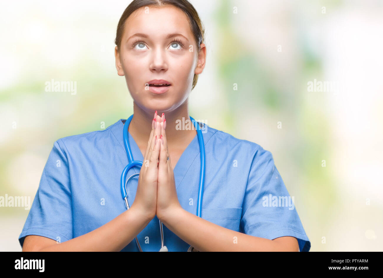 Young caucasian doctor woman wearing medical uniform over isolated ...