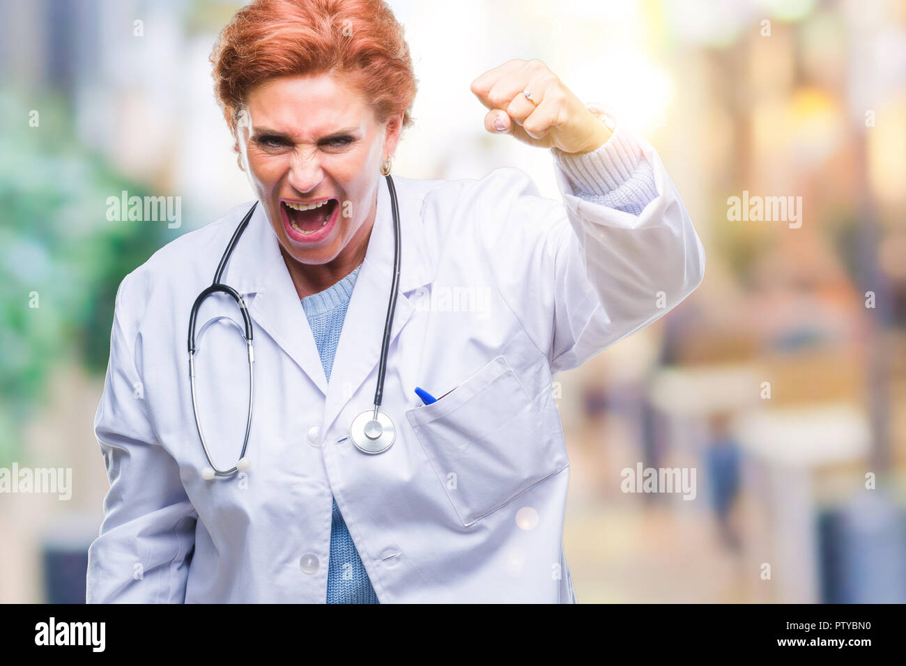 Senior caucasian doctor woman wearing medical uniform over isolated ...