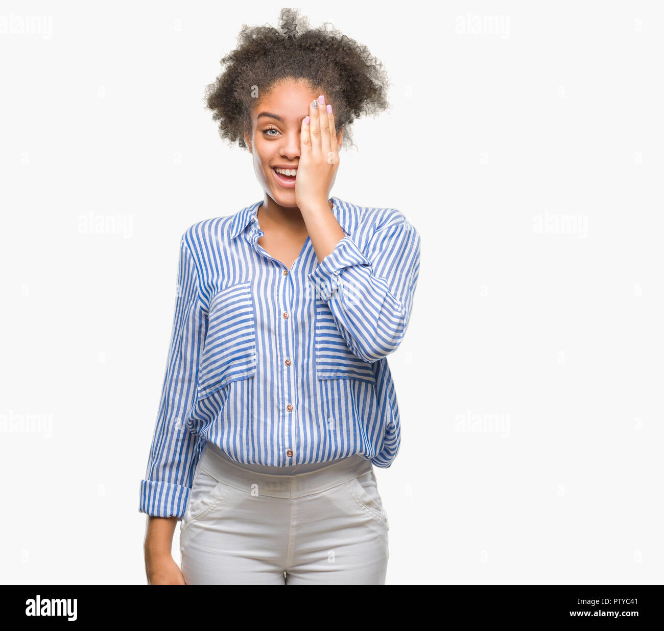 Young afro american woman over isolated background covering one eye ...