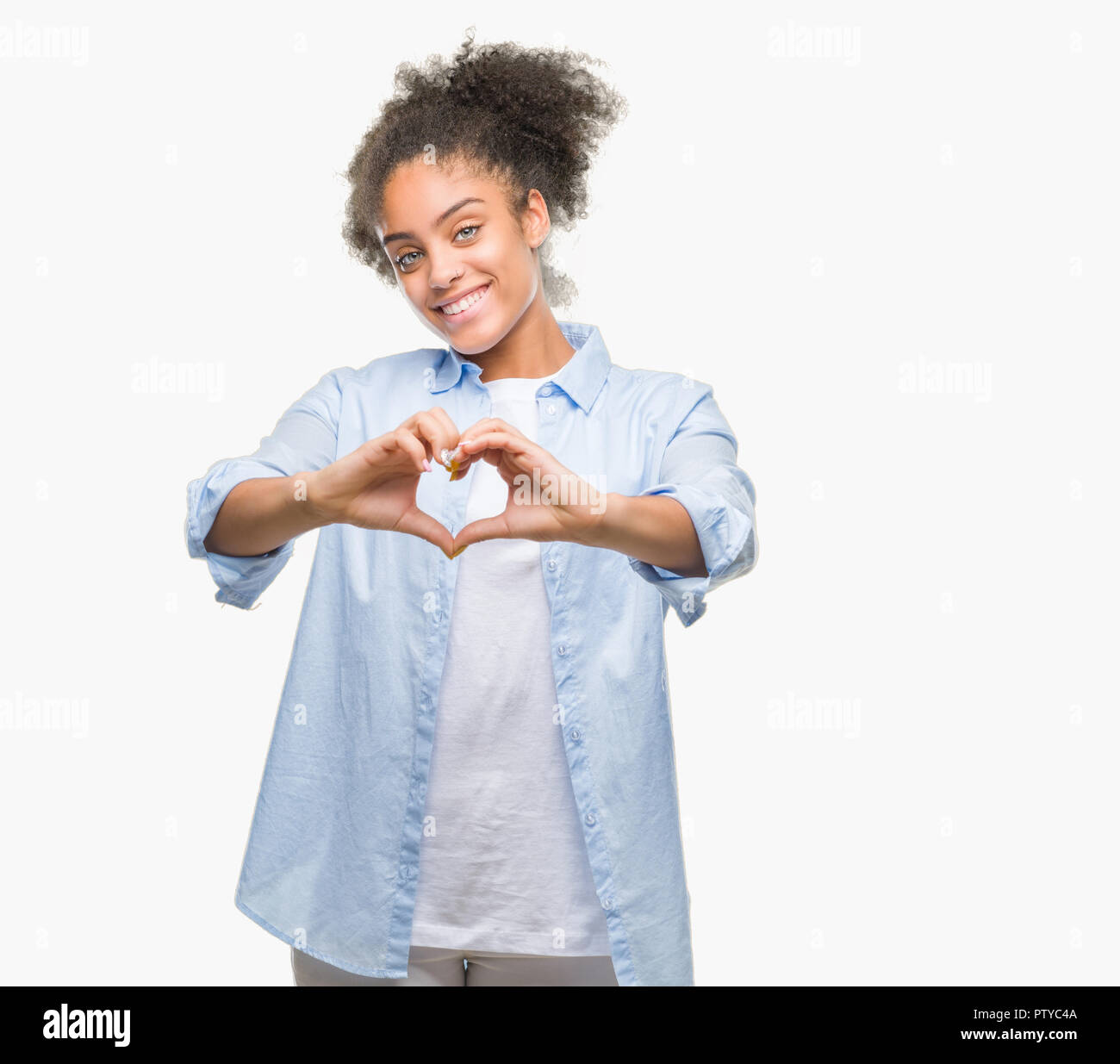 Young afro american woman over isolated background smiling in love ...