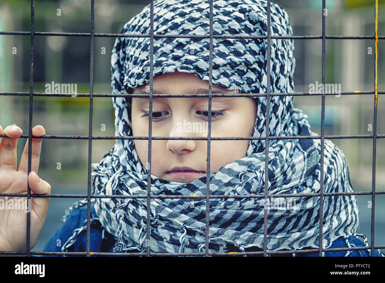 crying refugee girl from the east in a headscarf Stock Photo - Alamy