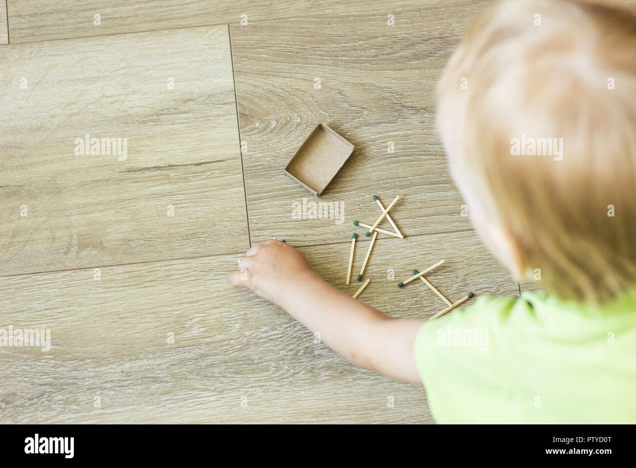 A child plays with matches, a fire, a child and matches, a danger Stock ...