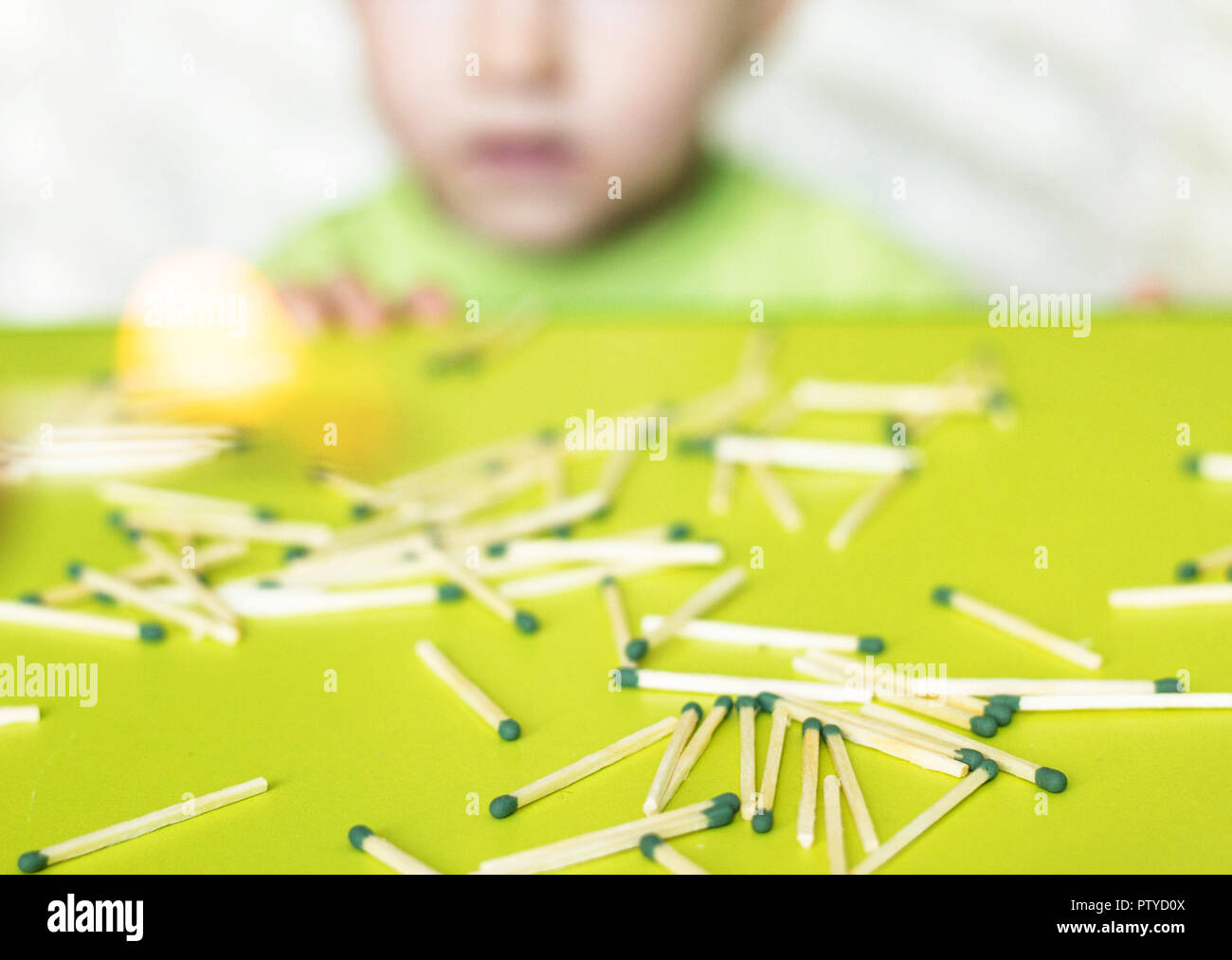 Little baby girl playing with matches, baby and matches, fire, lucifer ...