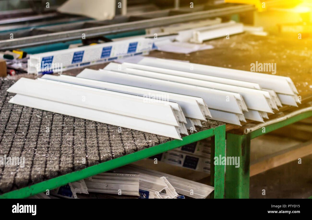 Production of pvc windows, plastic pvc profile lies on the table, close ...