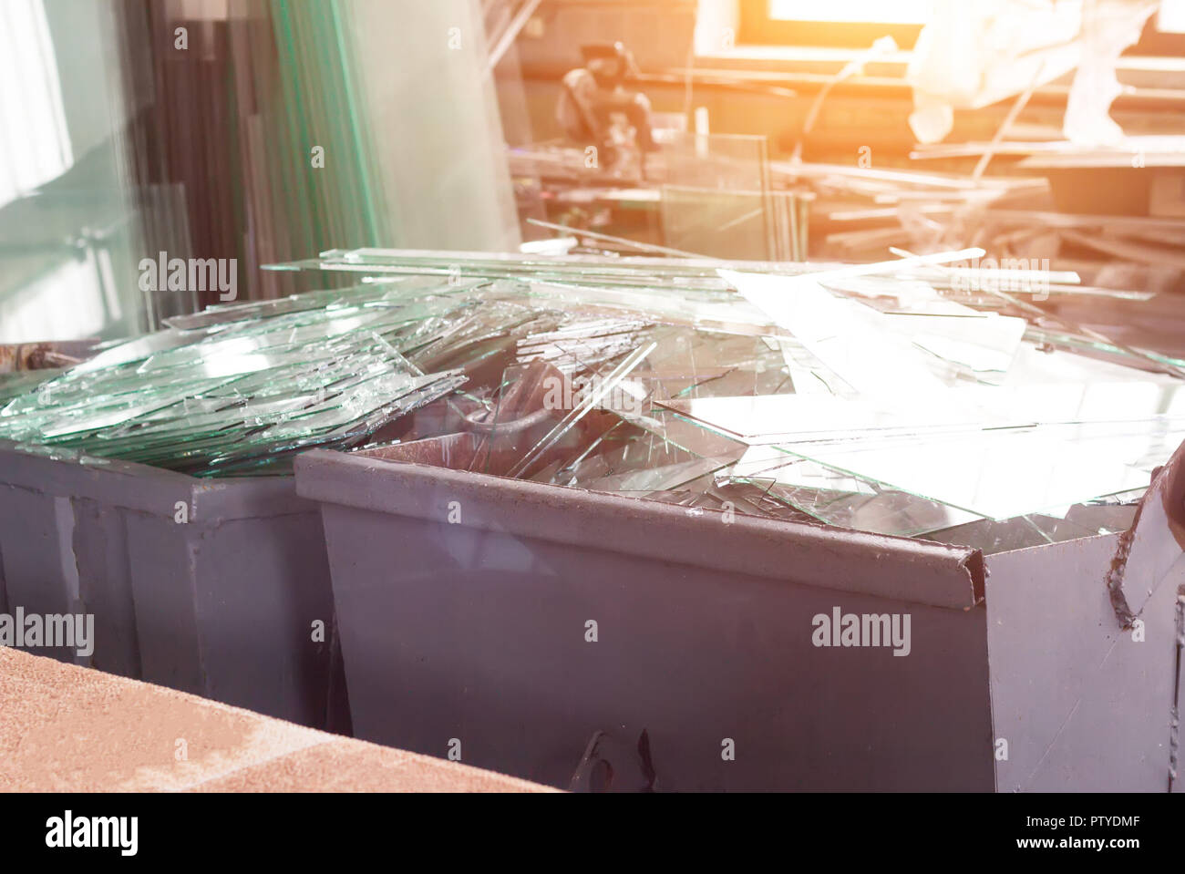 Large container with broken broken glass, manufacturing waste glass ...