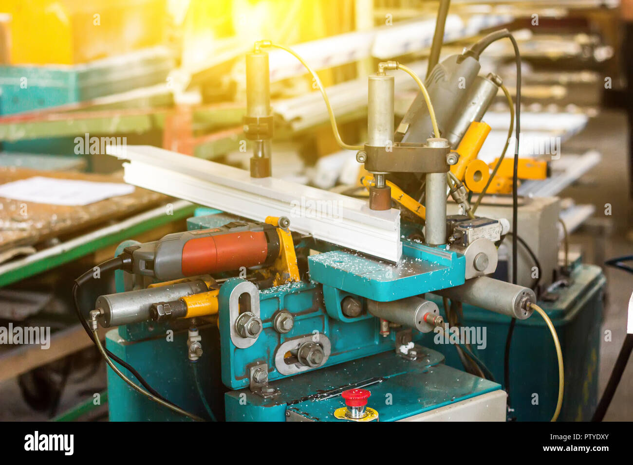 Production of PVC windows, a machine for making holes in the plastic ...