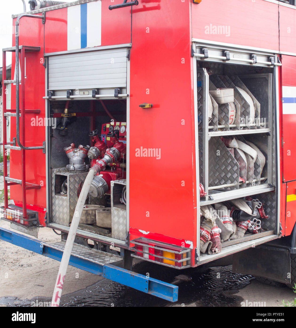 Back of the fire truck, hoses and equipment, red fire engine, special ...