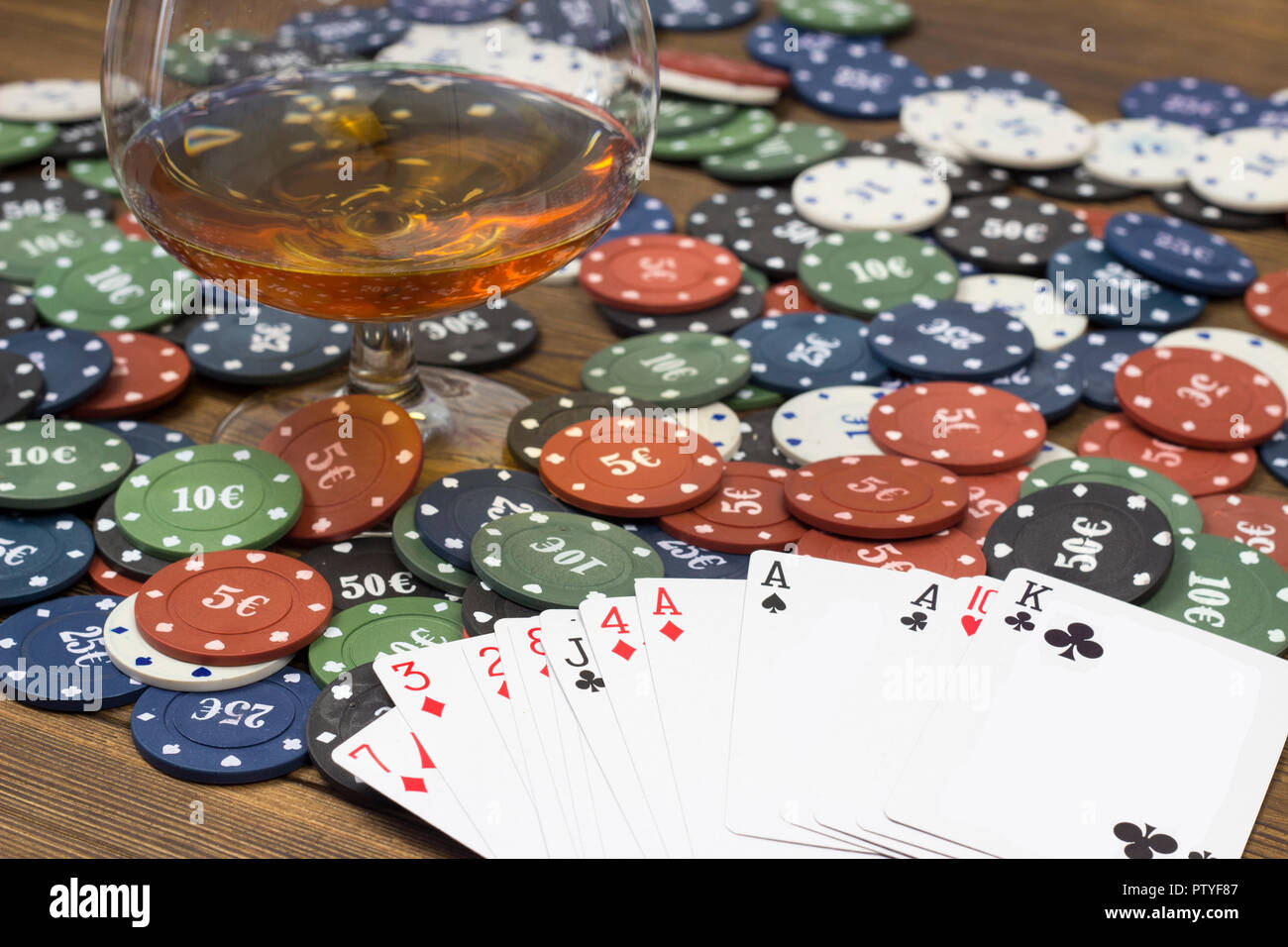 Poker chips card alcohol Stock Photo - Alamy