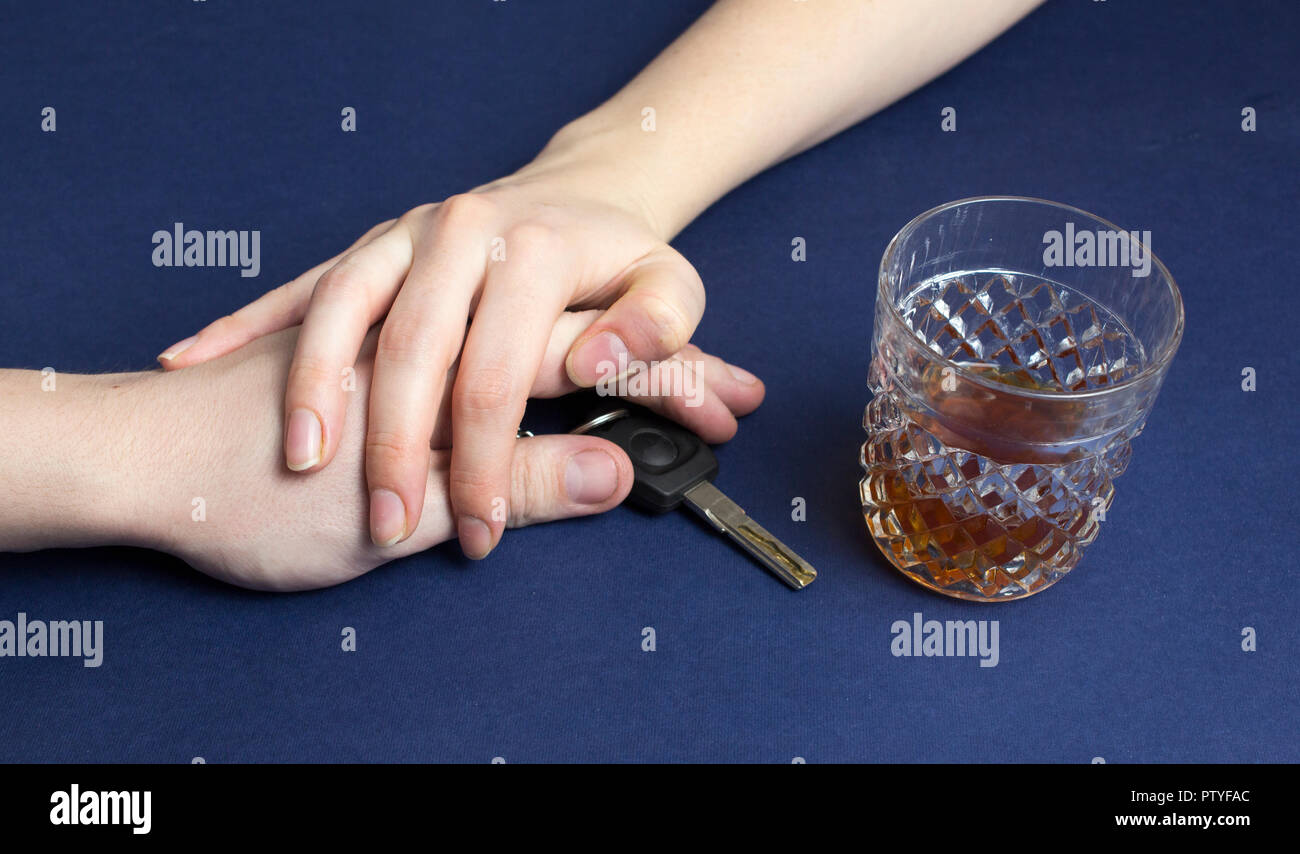 Car keys alcohol and hands Stock Photo - Alamy