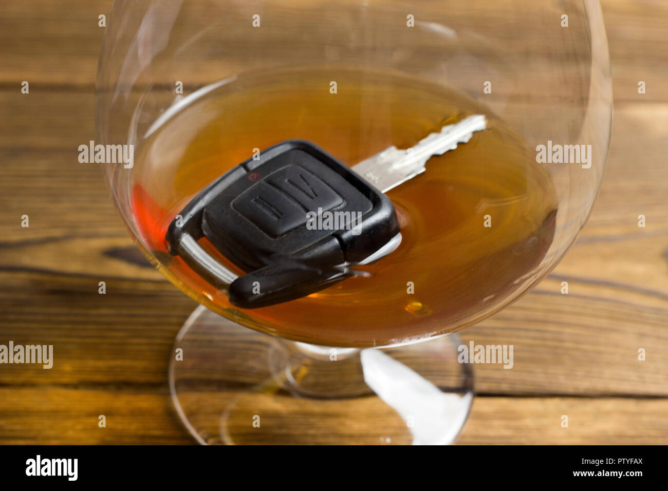Car key in glass hi-res stock photography and images - Alamy