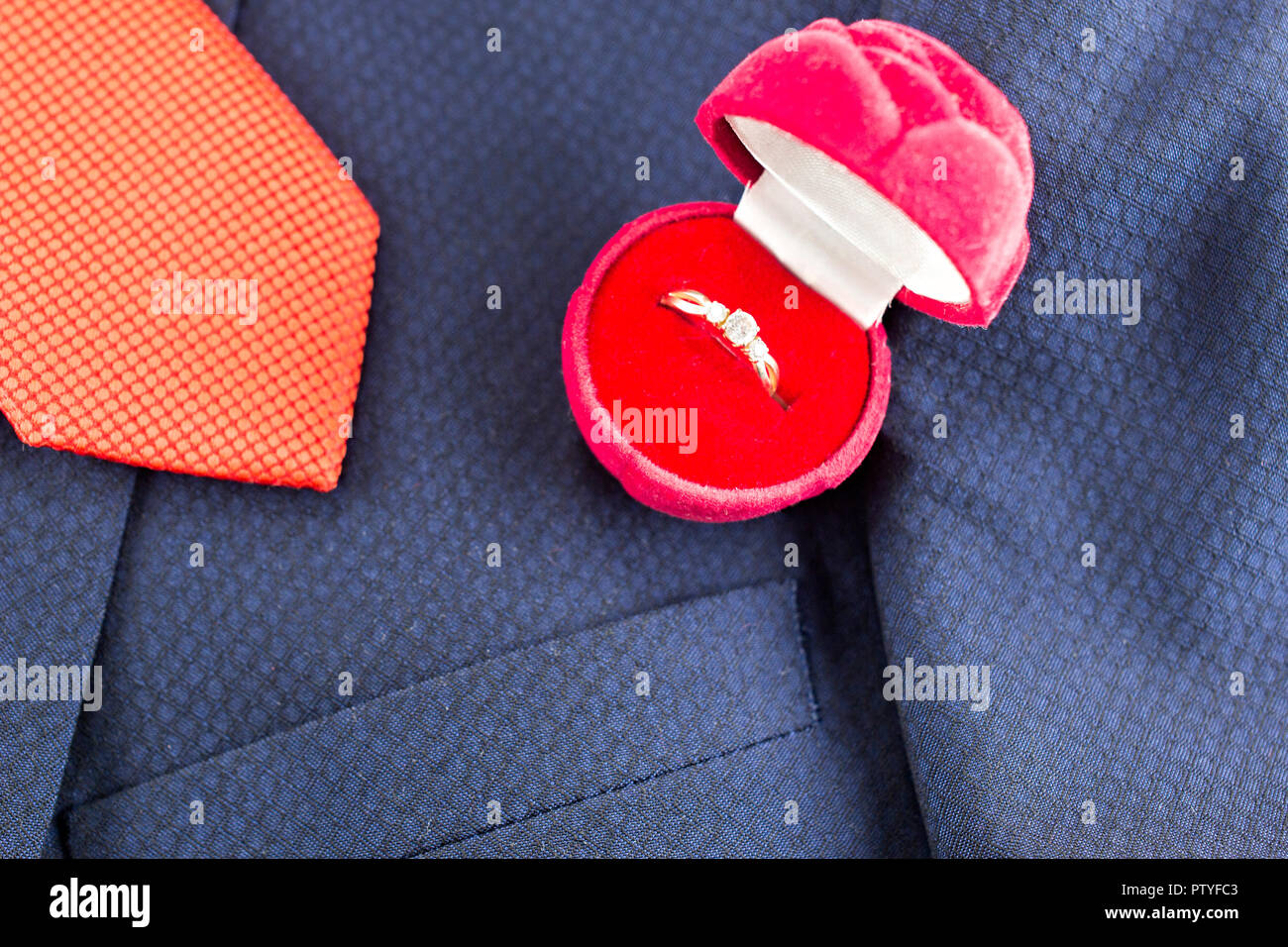 Red tie ring hi-res stock photography and images - Alamy