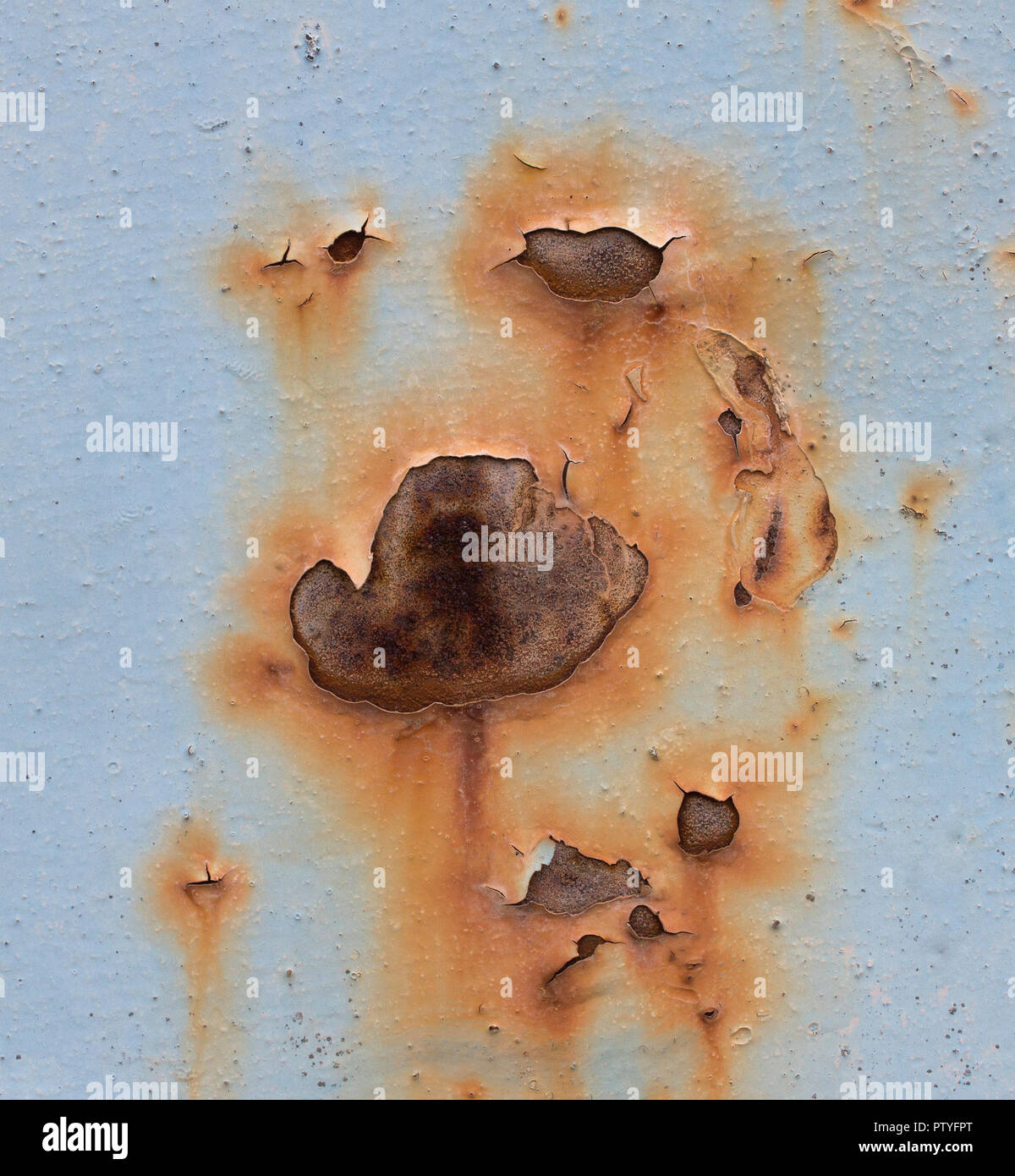 Corrosion of metal on a blue background, texture Stock Photo - Alamy