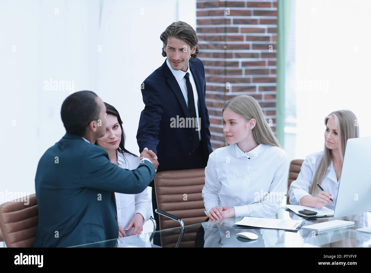 business partners conducting a workshop in the office Stock Photo - Alamy