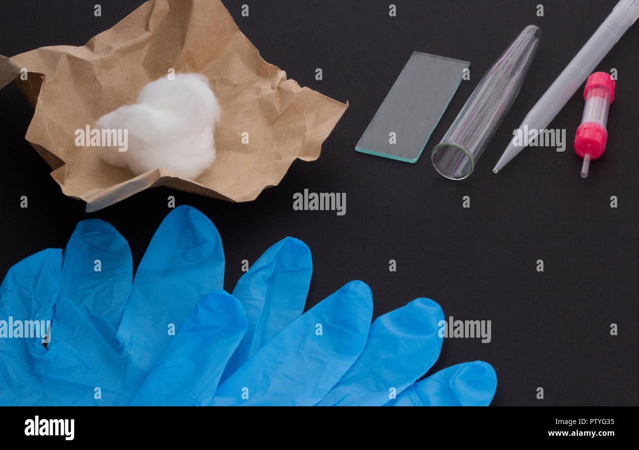 Medical set for taking blood from a finger on a black background Stock ...