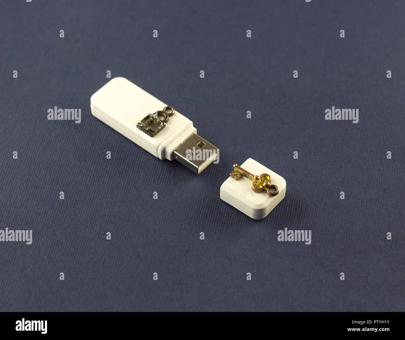 White flash drive with a key and a lock on a blue background Stock ...