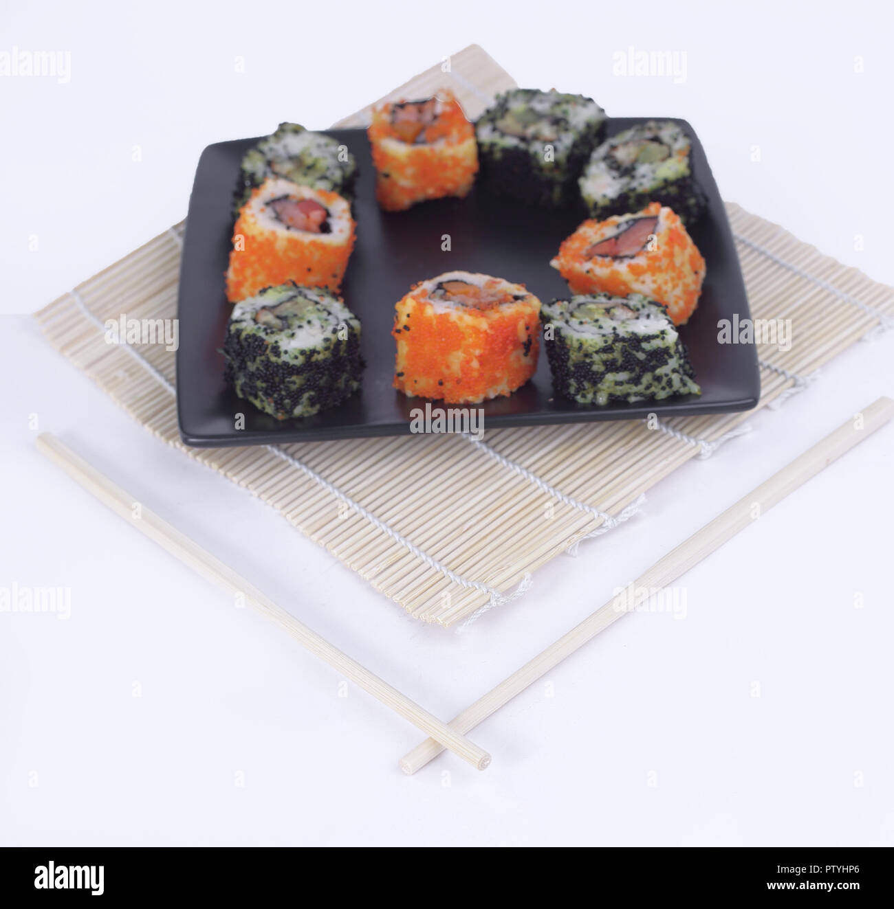 different types of Maki sushi on a black plate Stock Photo - Alamy
