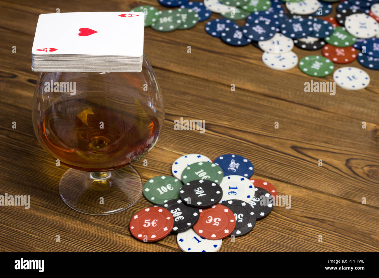 Poker chips card alcohol Stock Photo - Alamy