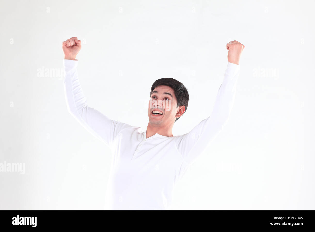 concept of victory: the triumphant businessman on white background ...