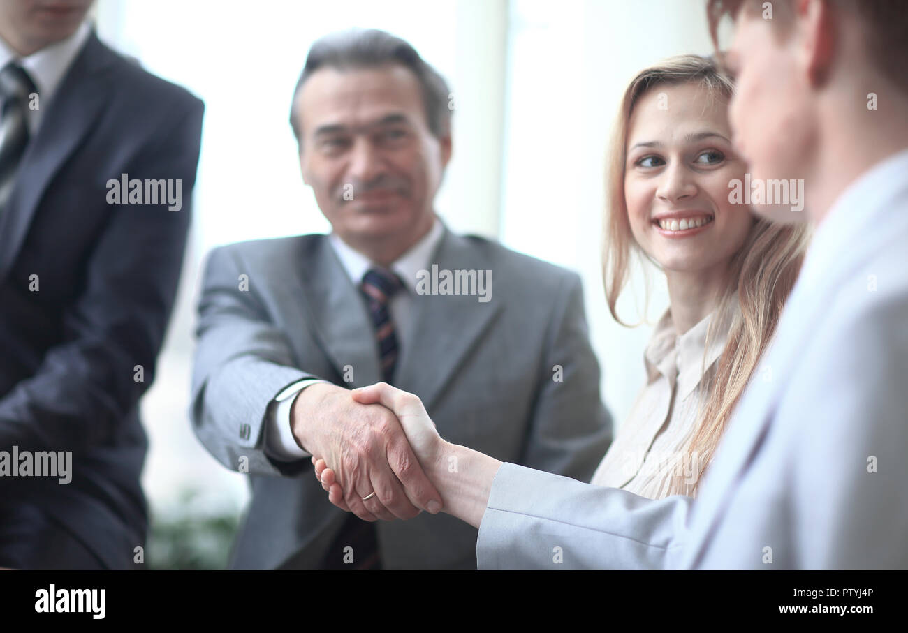 Business partners handshaking close hi-res stock photography and images ...