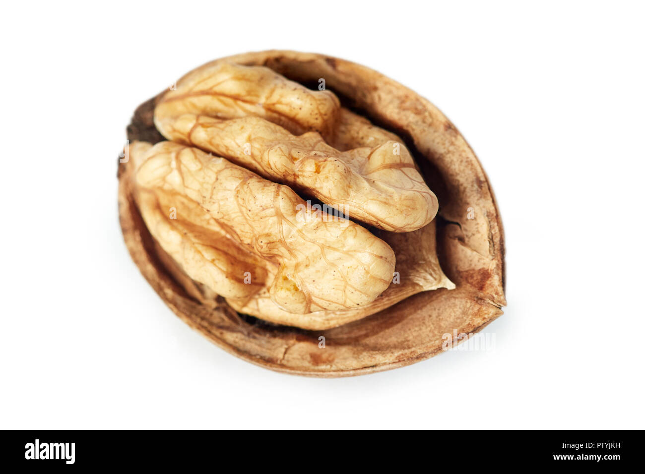 Closeup of single halved walnut isolated on white background Stock ...