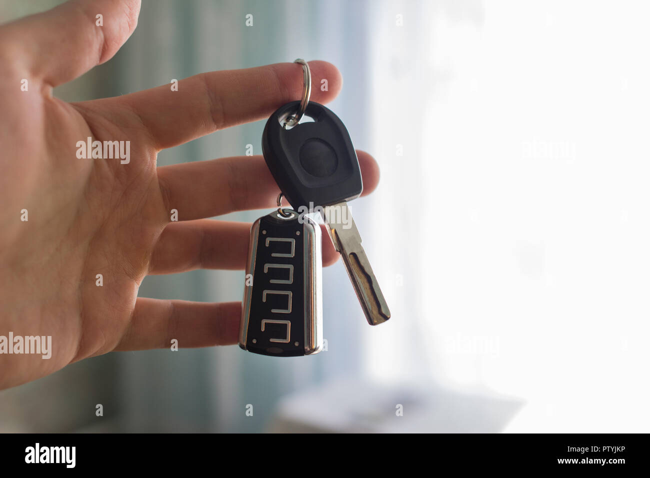 Car keys in hand hi-res stock photography and images - Alamy