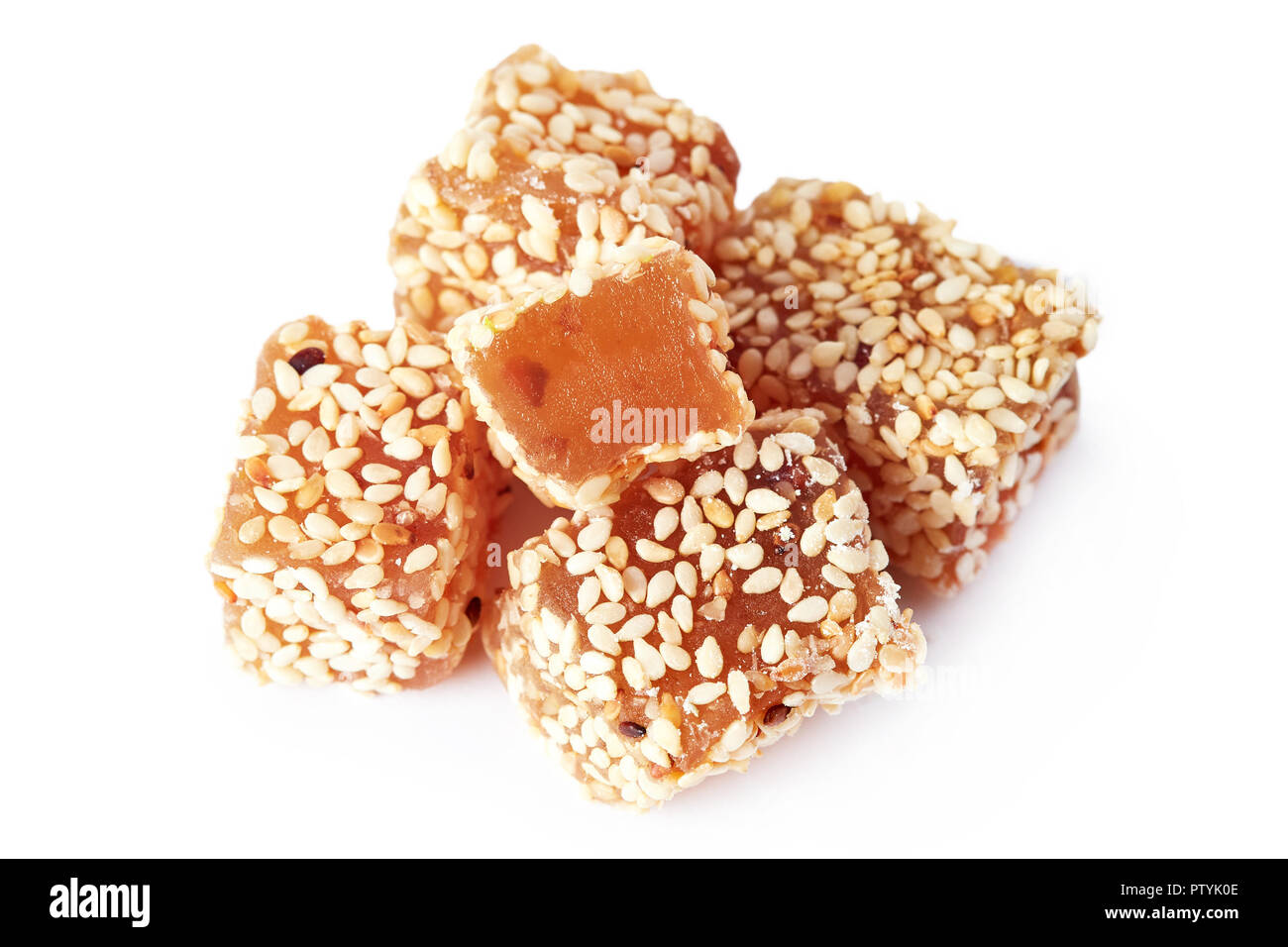 Dessert sweet Turkish delight (lokum) with sesame seeds isolated on ...