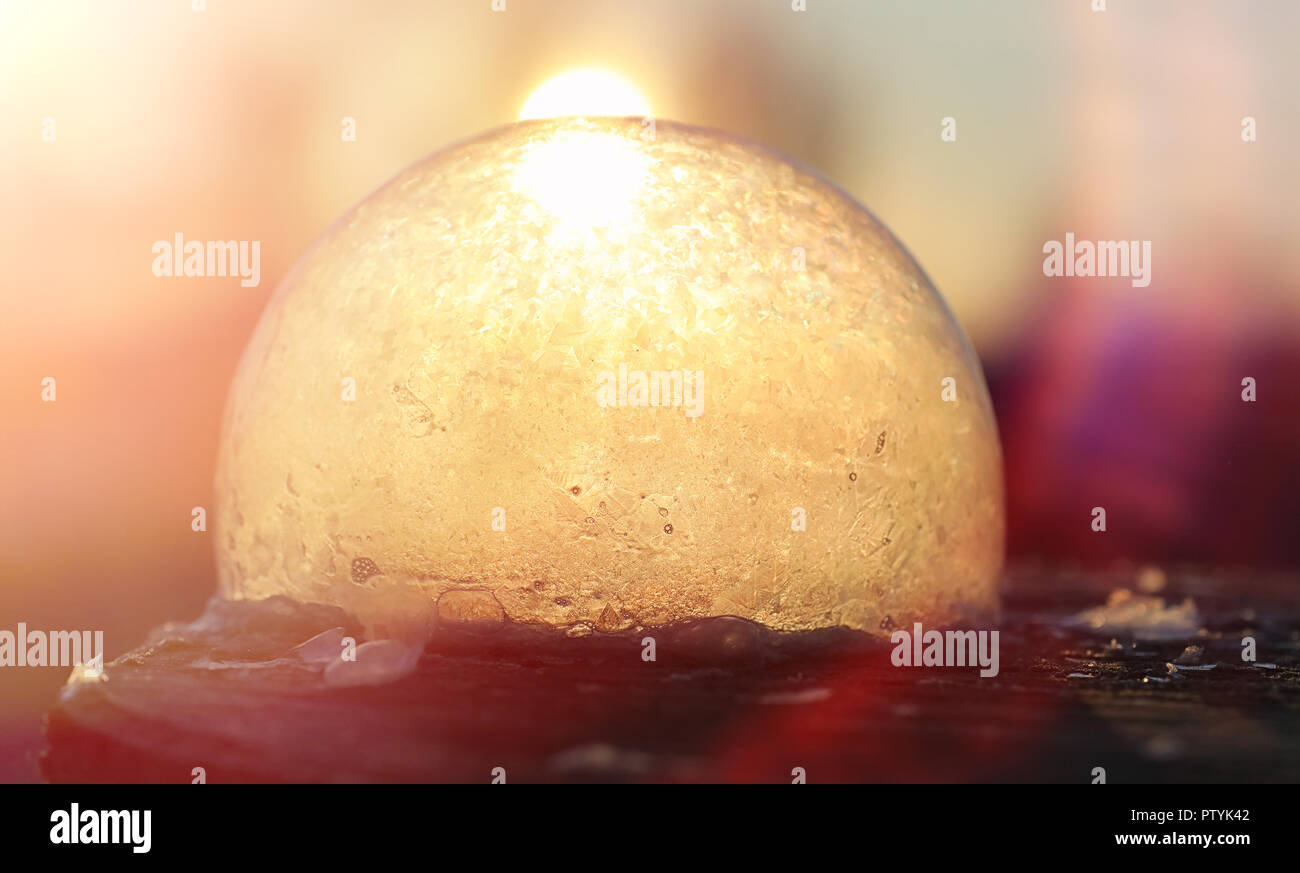 Soap bubbles freeze in the cold. Winter soapy water freezes in air ...