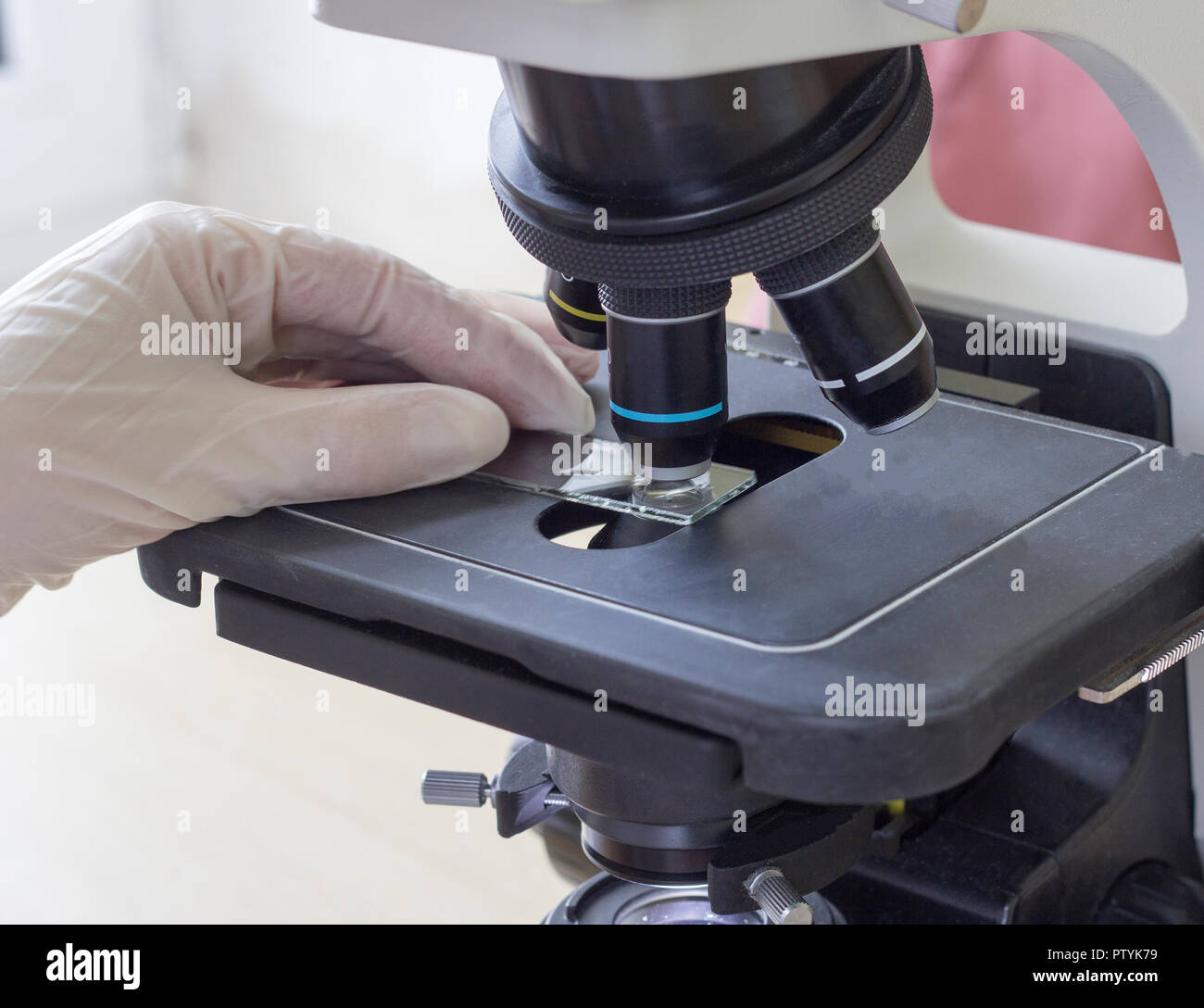 blood analysis microscope, hand, glove, close-up Stock Photo - Alamy