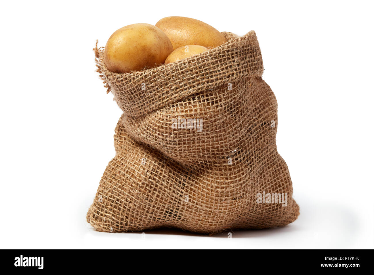 Burlap sack of fresh raw potatoes isolated on white background Stock ...