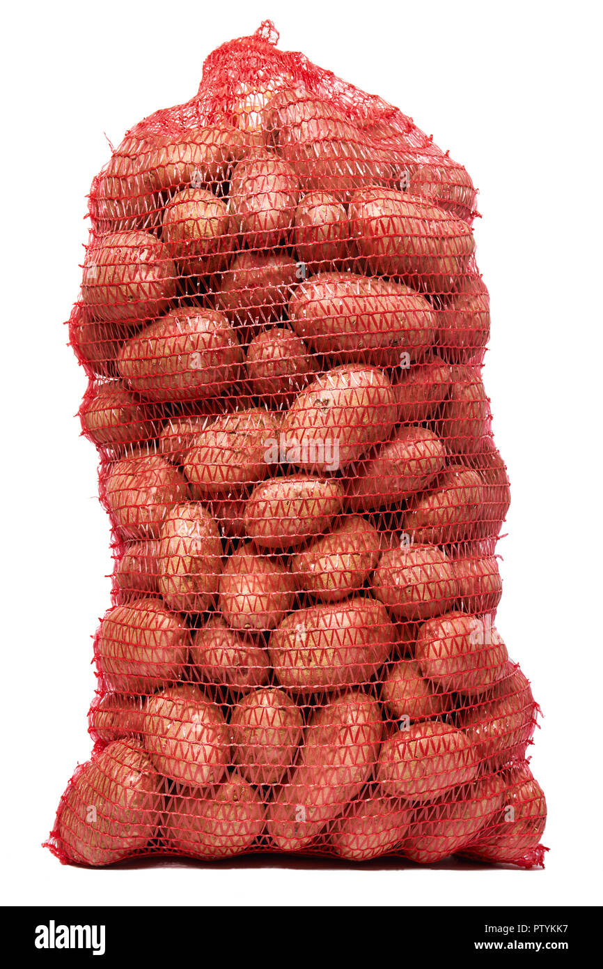 Sack of fresh raw potatoes isolated on white background Stock Photo - Alamy