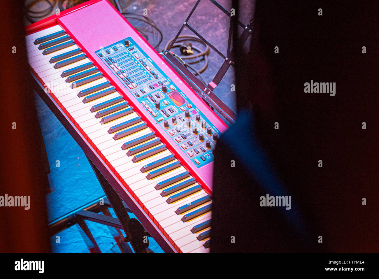 Red Electronic Synthesizer Piano Keyboard. Break at Swing Festival ...