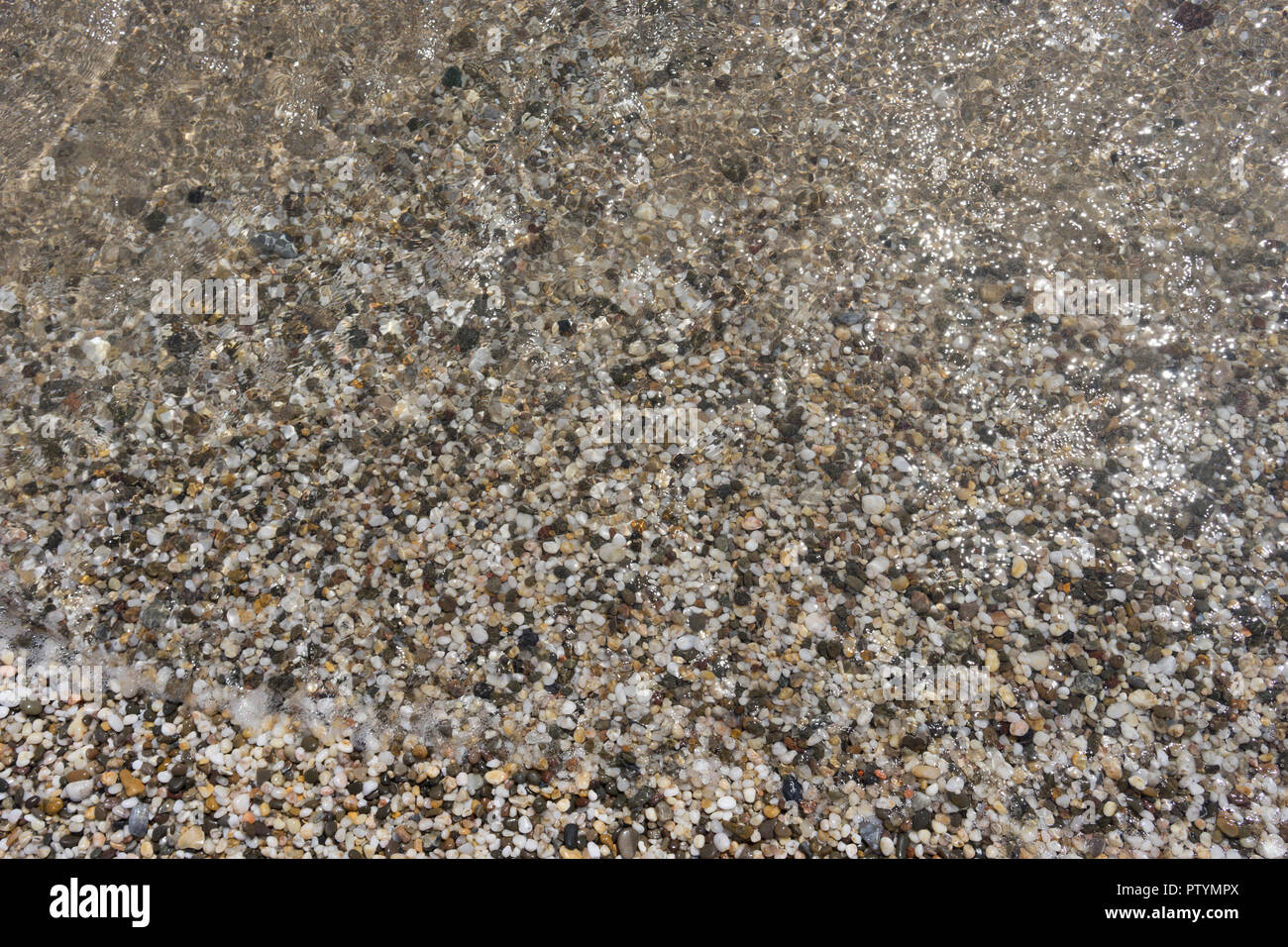 Natural background of small colored pebbles on the beach Stock Photo ...