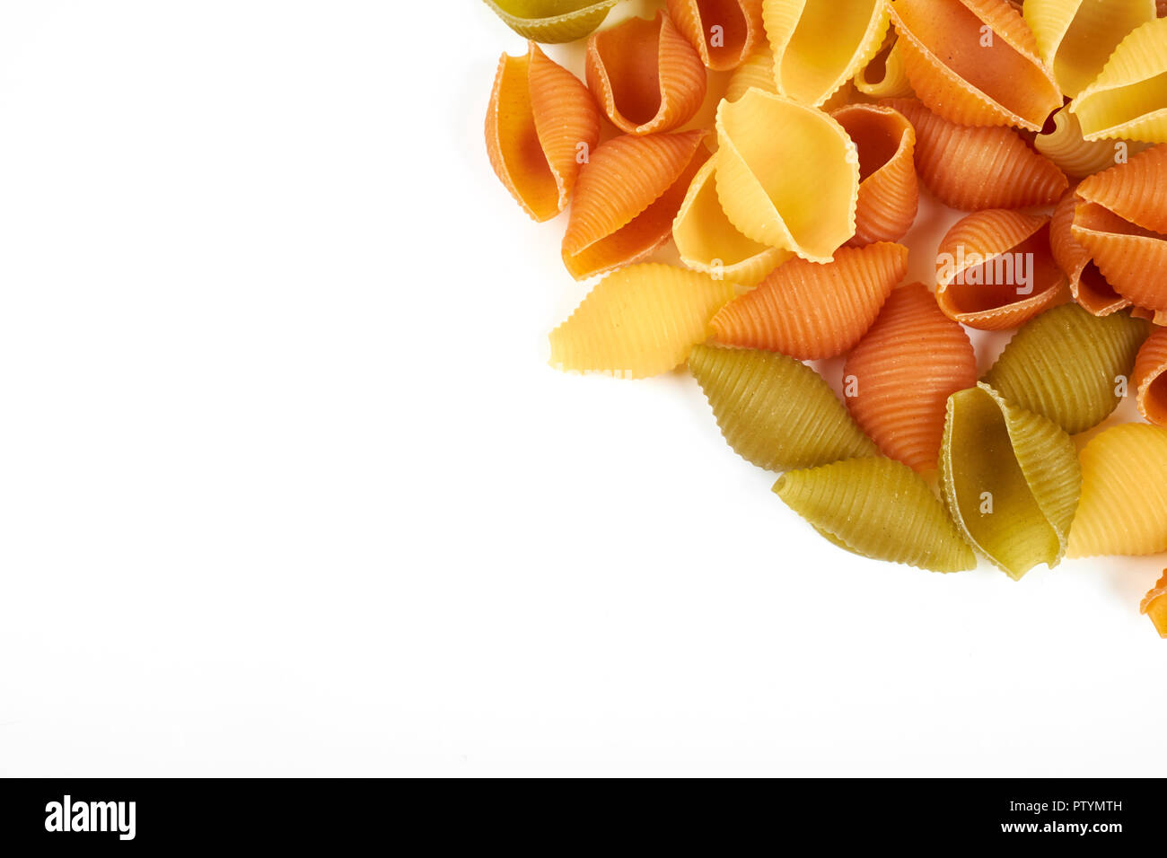 three colors conchiglie paste isolated on white background Stock Photo ...