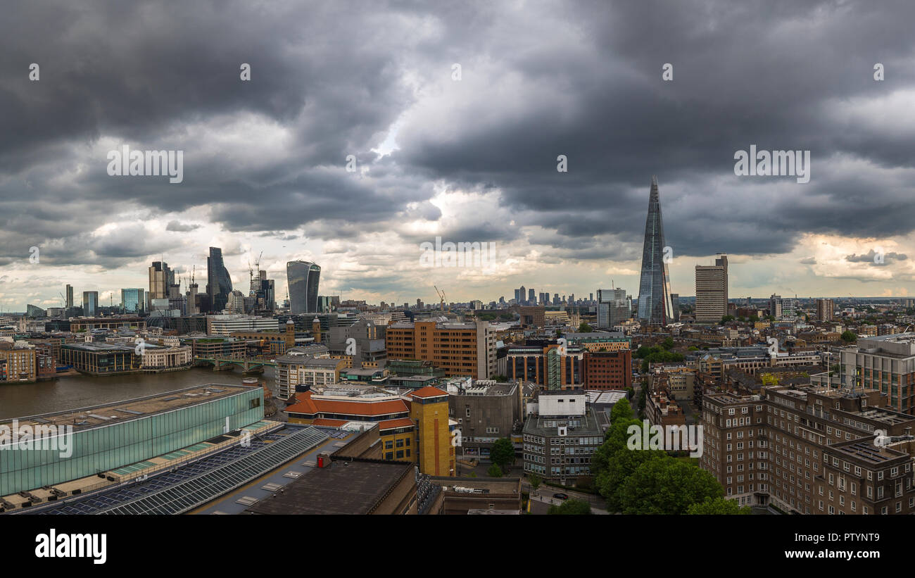 Aerial view of City of London with storm clouds gathering Stock Photo ...