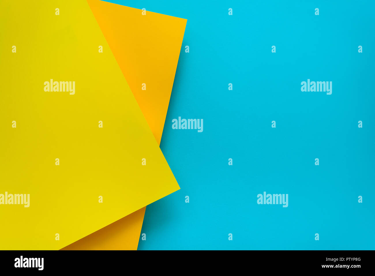 Blue and yellow pastel color papered background. Volume geometric flat ...