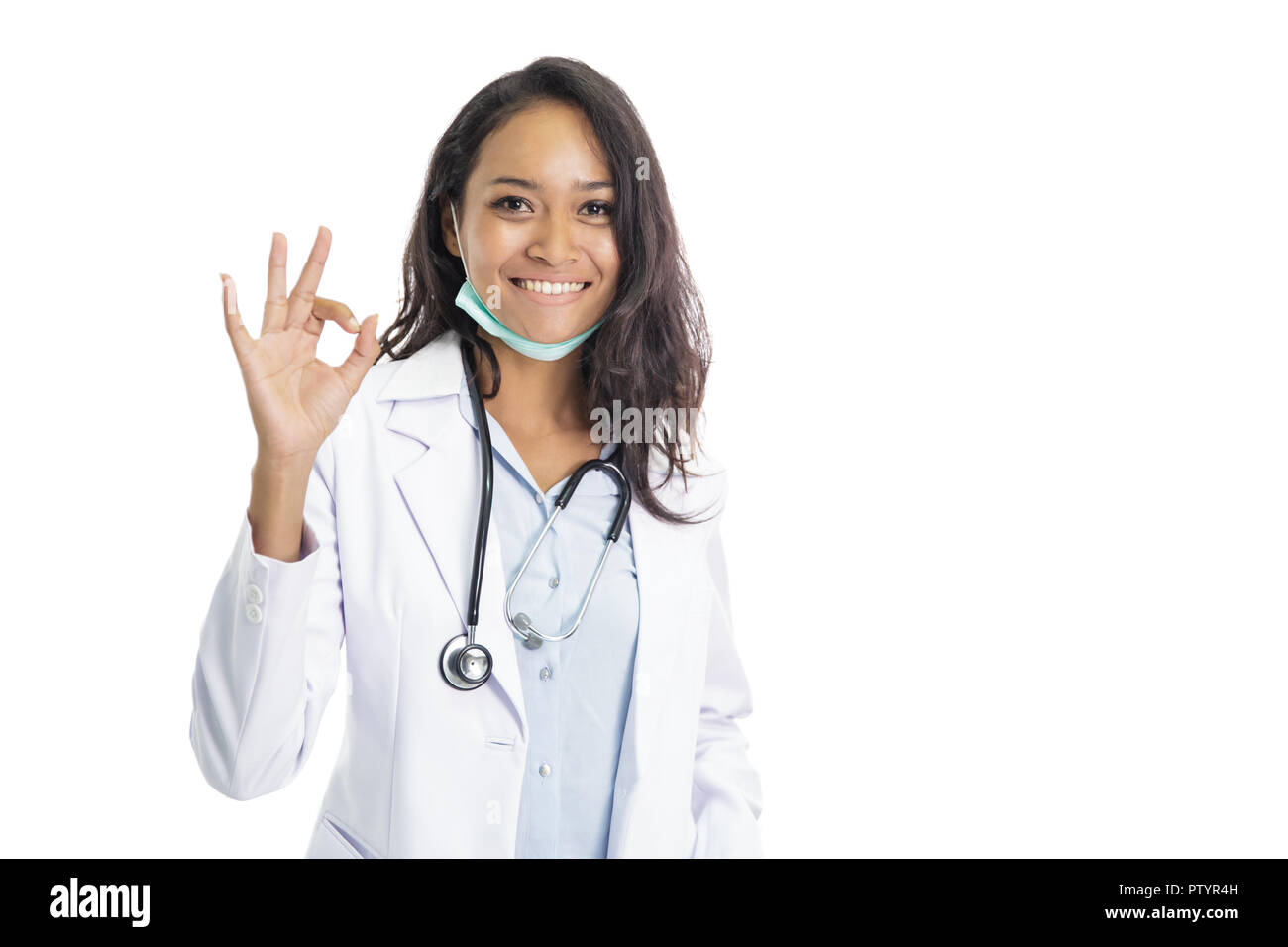 beautiful young doctor smiling with stethoscope giving Ok sign Stock ...