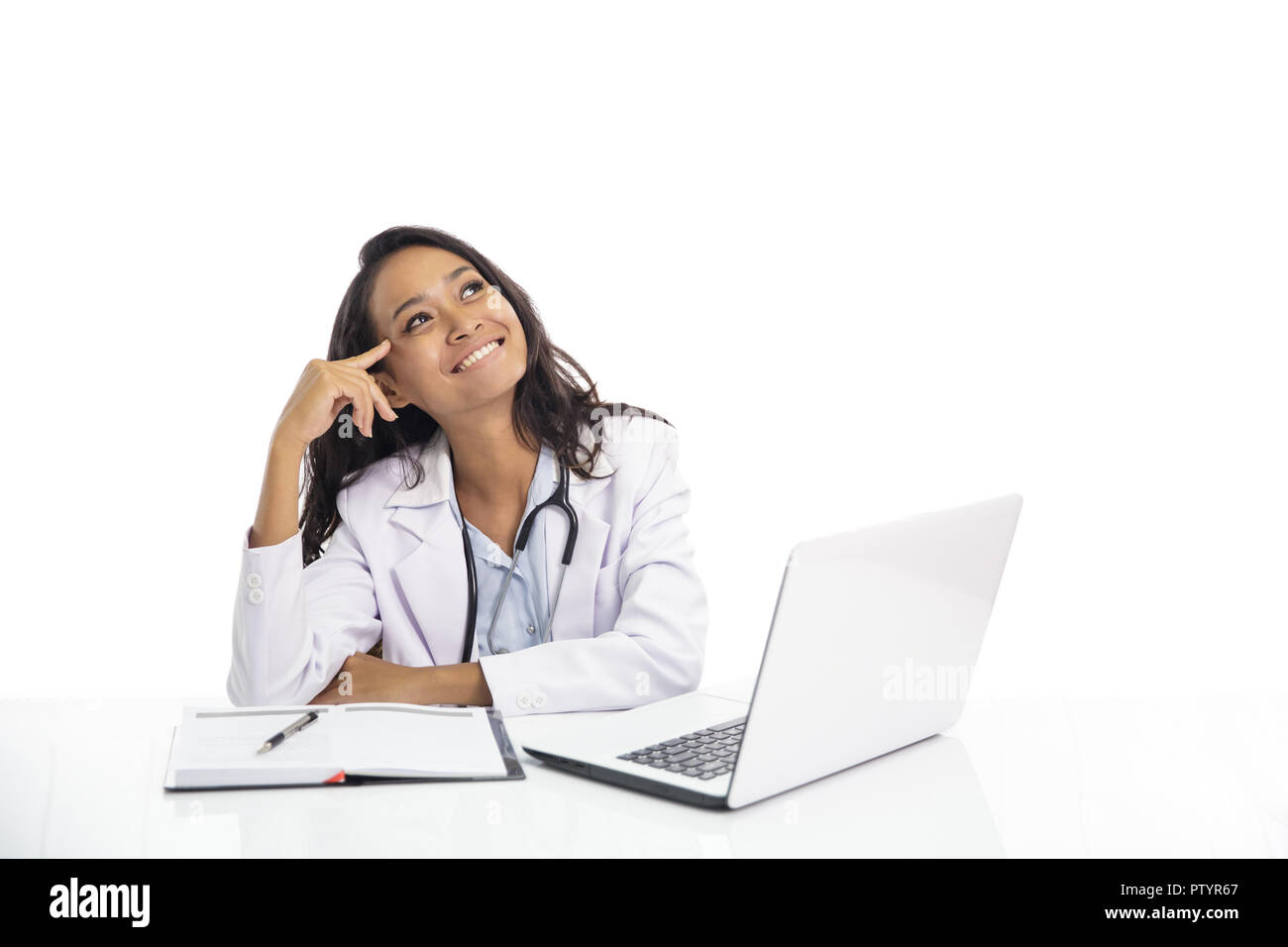 Young female doctor thinking working hi-res stock photography and ...