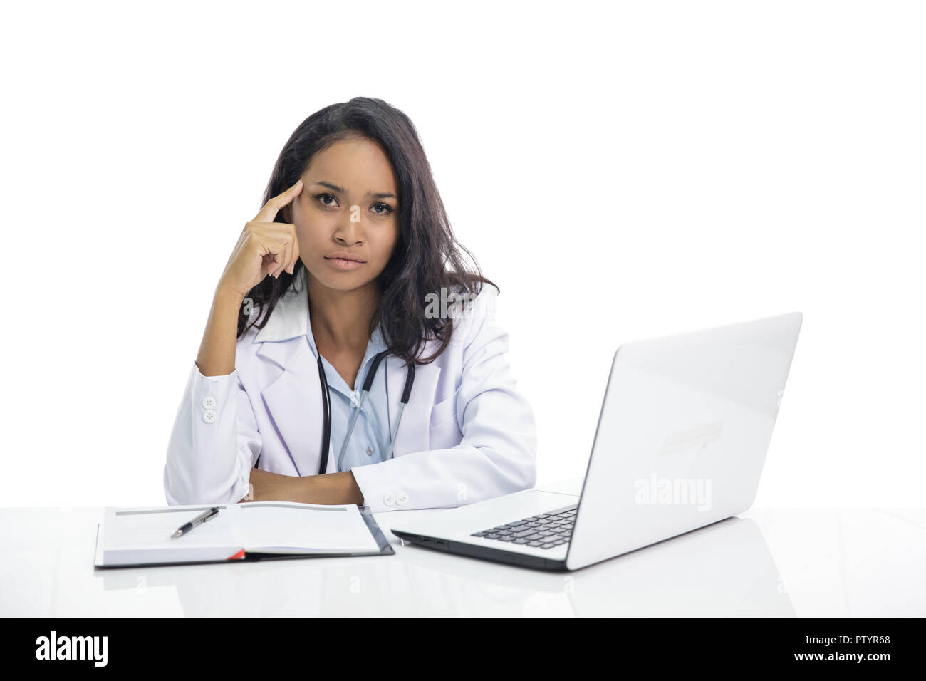 asian young doctor with flat expression while sitting on her wo Stock ...