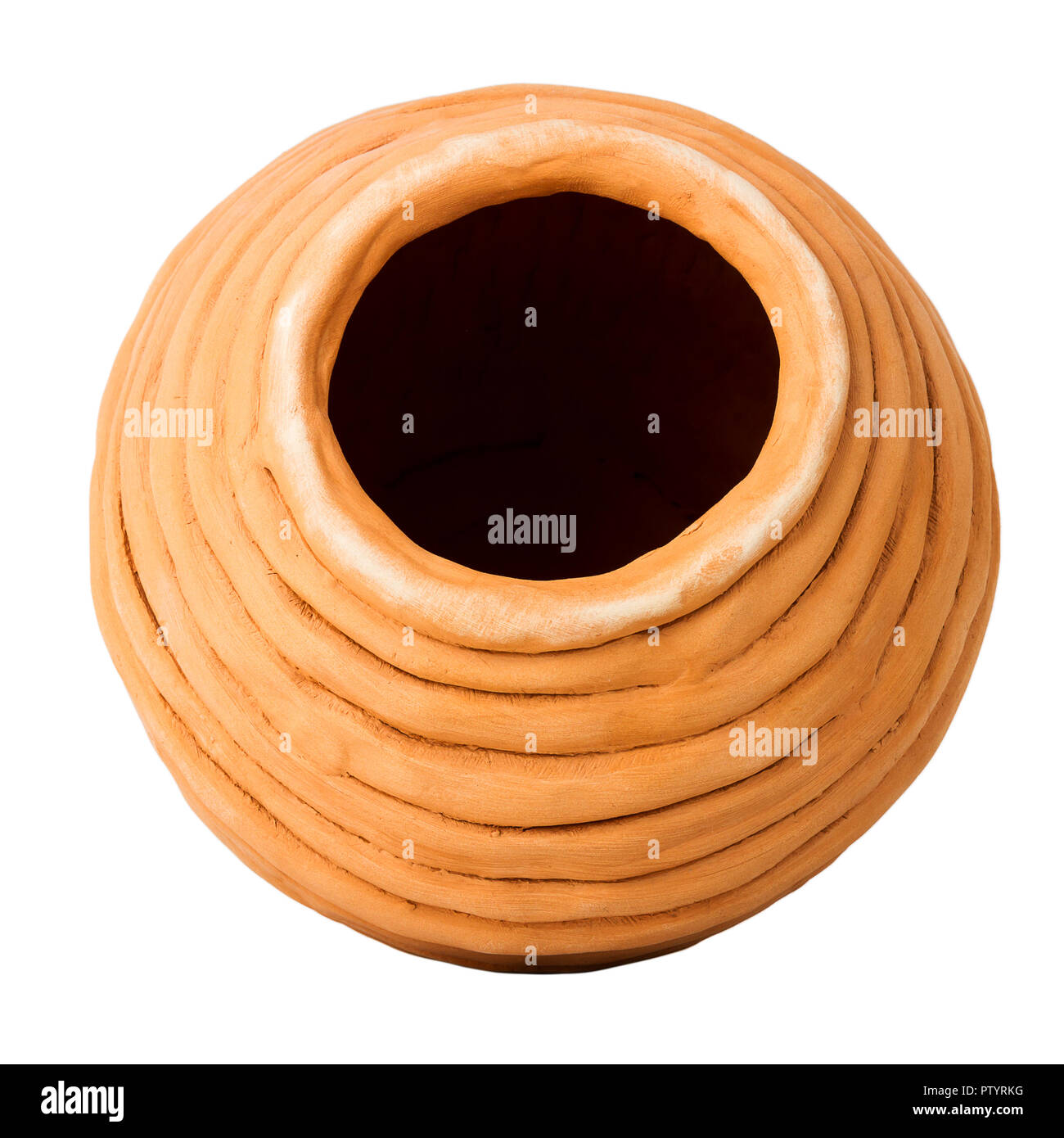 Unglazed handmade coiled pottery pot made of red clay isolated on white ...