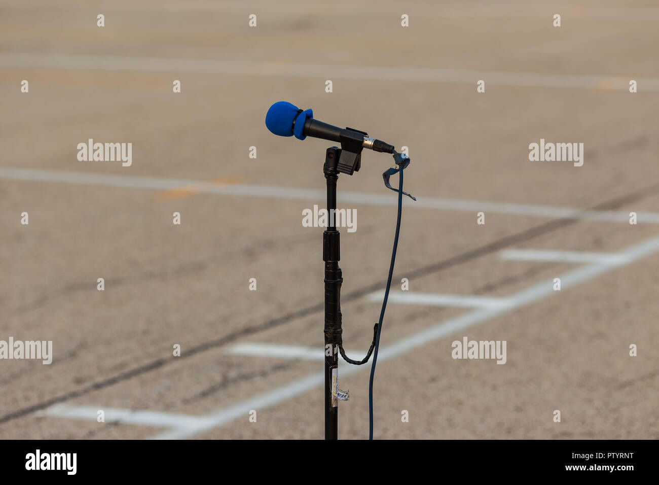 a field microphone for soloists performing at a marching band rehearsal ...