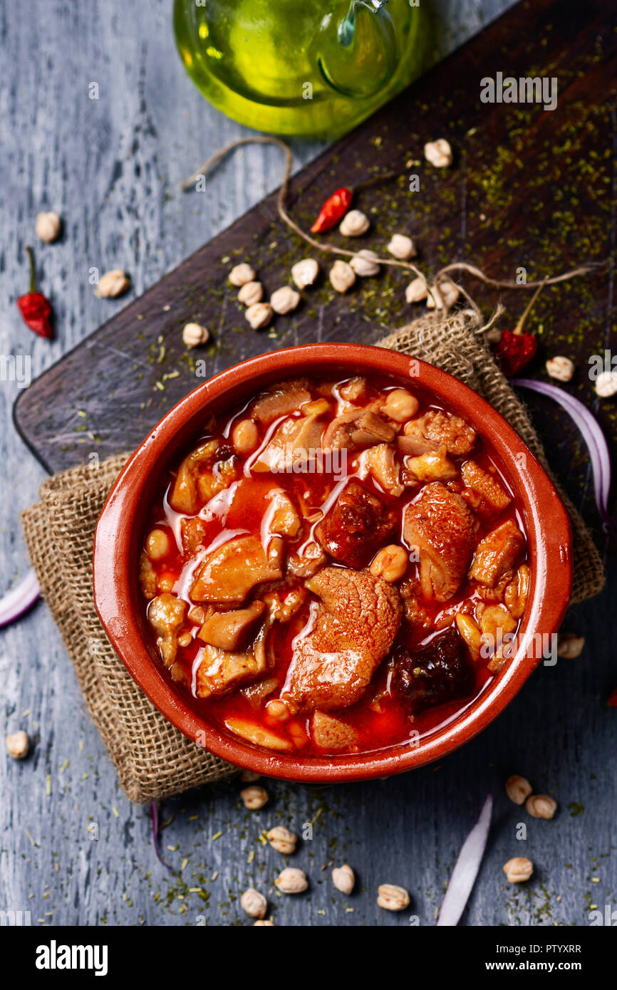 high angle view of an earthenware bowl with spanish callos, a typical ...