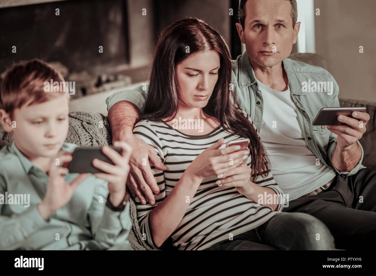 Attentive male person looking straight at camera Stock Photo - Alamy