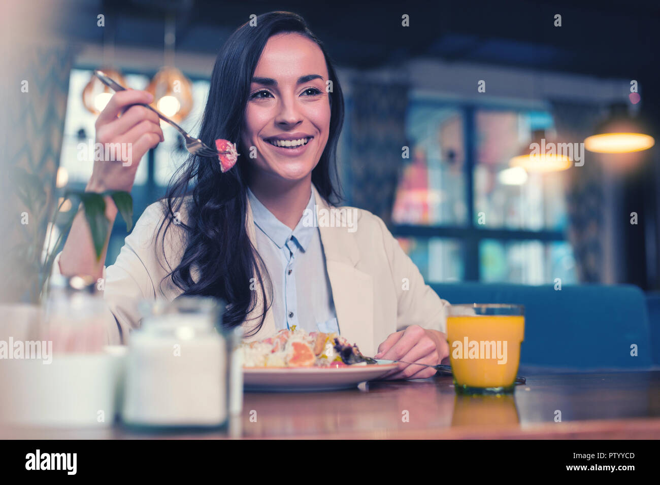 Portrait of dreamy girl that having diner Stock Photo - Alamy