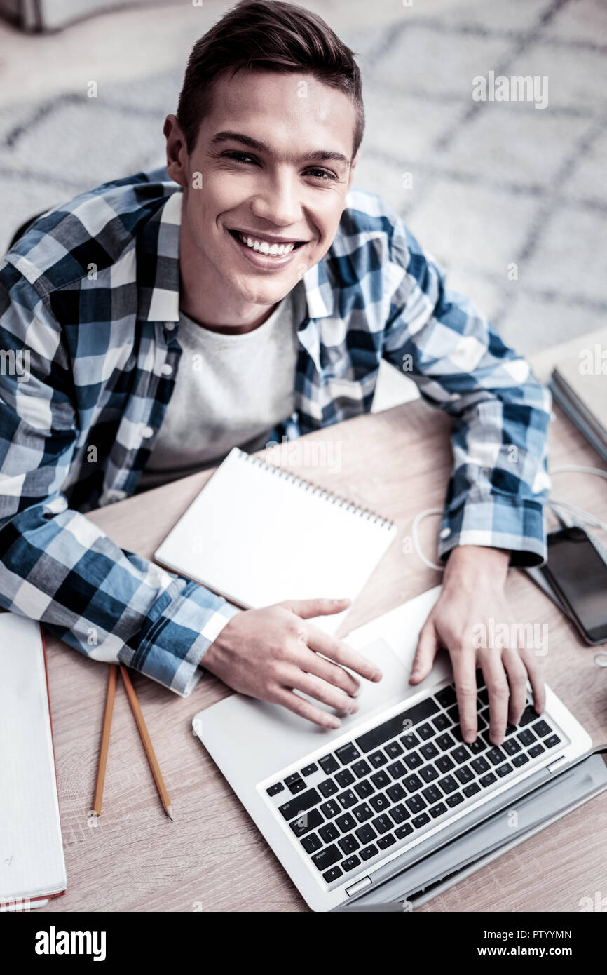Emotional smiling man student hi-res stock photography and images - Alamy