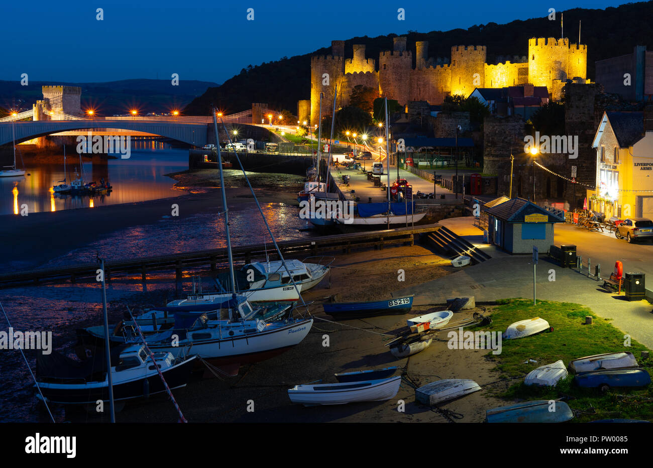 Conwy Quay with Conwy Castle and the Telford Rail Bridge in the ...