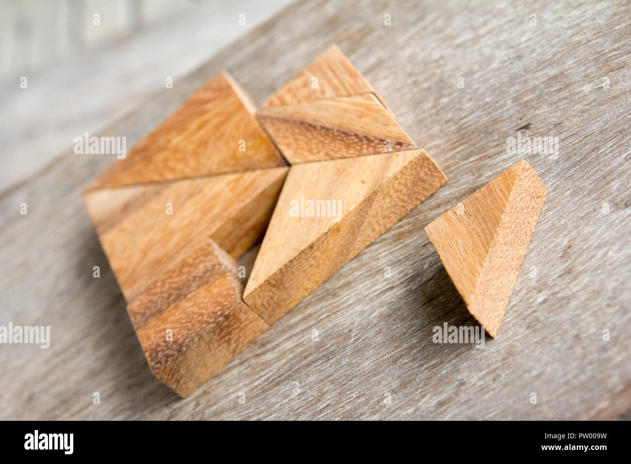 Tangram in heart shape wait for fulfill to complete on wooden ...