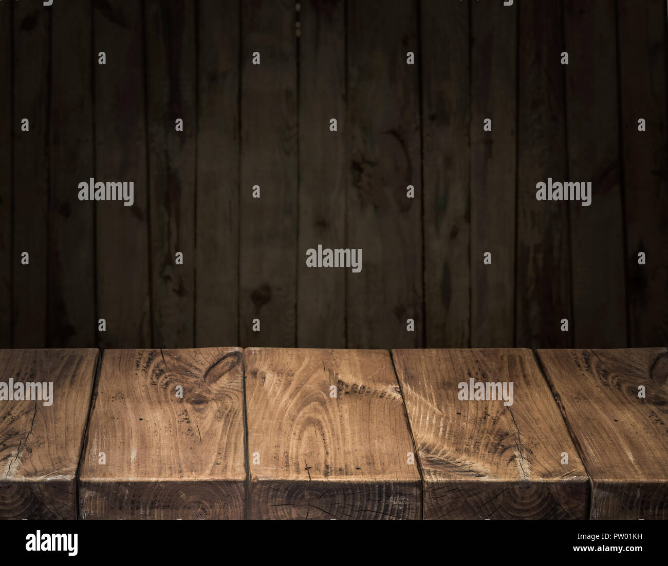 Old wooden tabletop and wooden wall at the background Stock Photo - Alamy